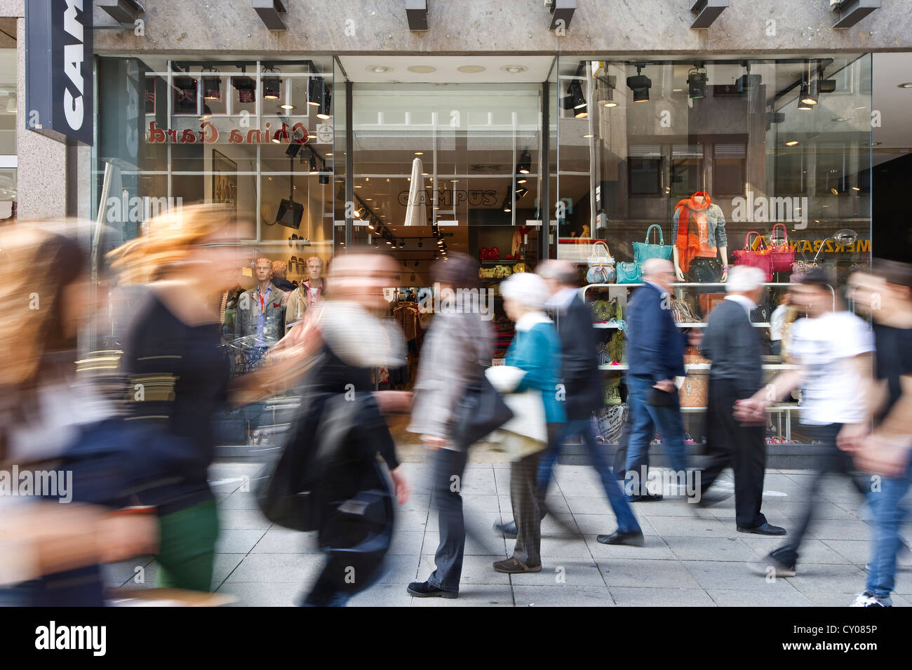 Pedestrian zone with people walking pass, motion blur, Stuttgart, Baden ...
