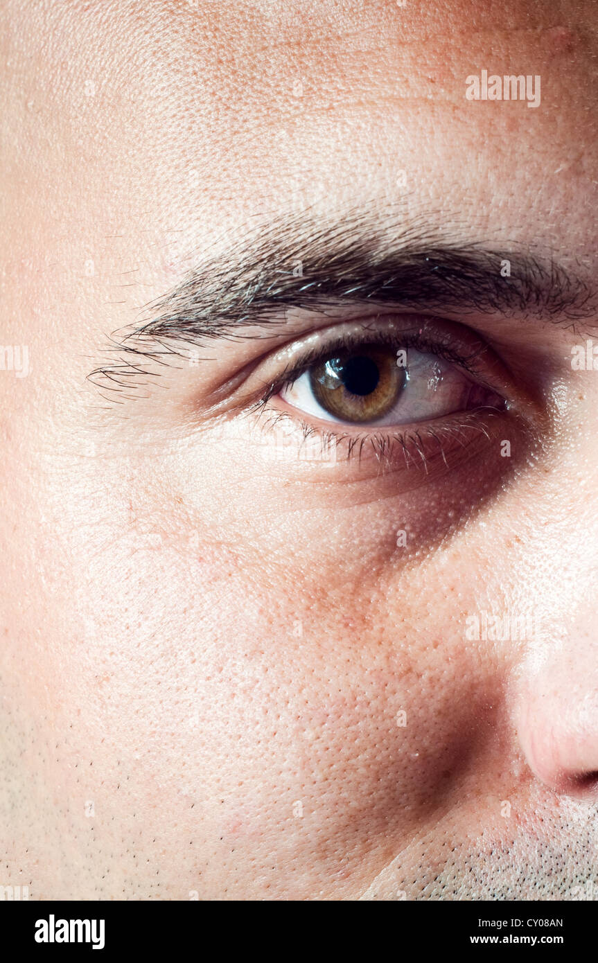 Brown color male eye, close up image Stock Photo - Alamy