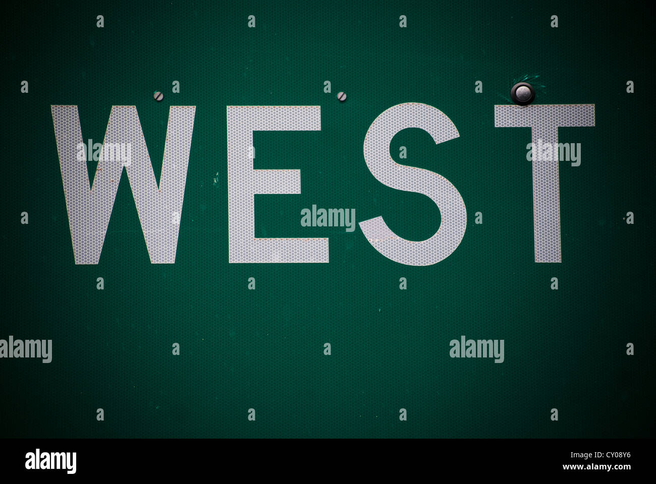 detailed close up of interstate road sign with the word "west." taken ...