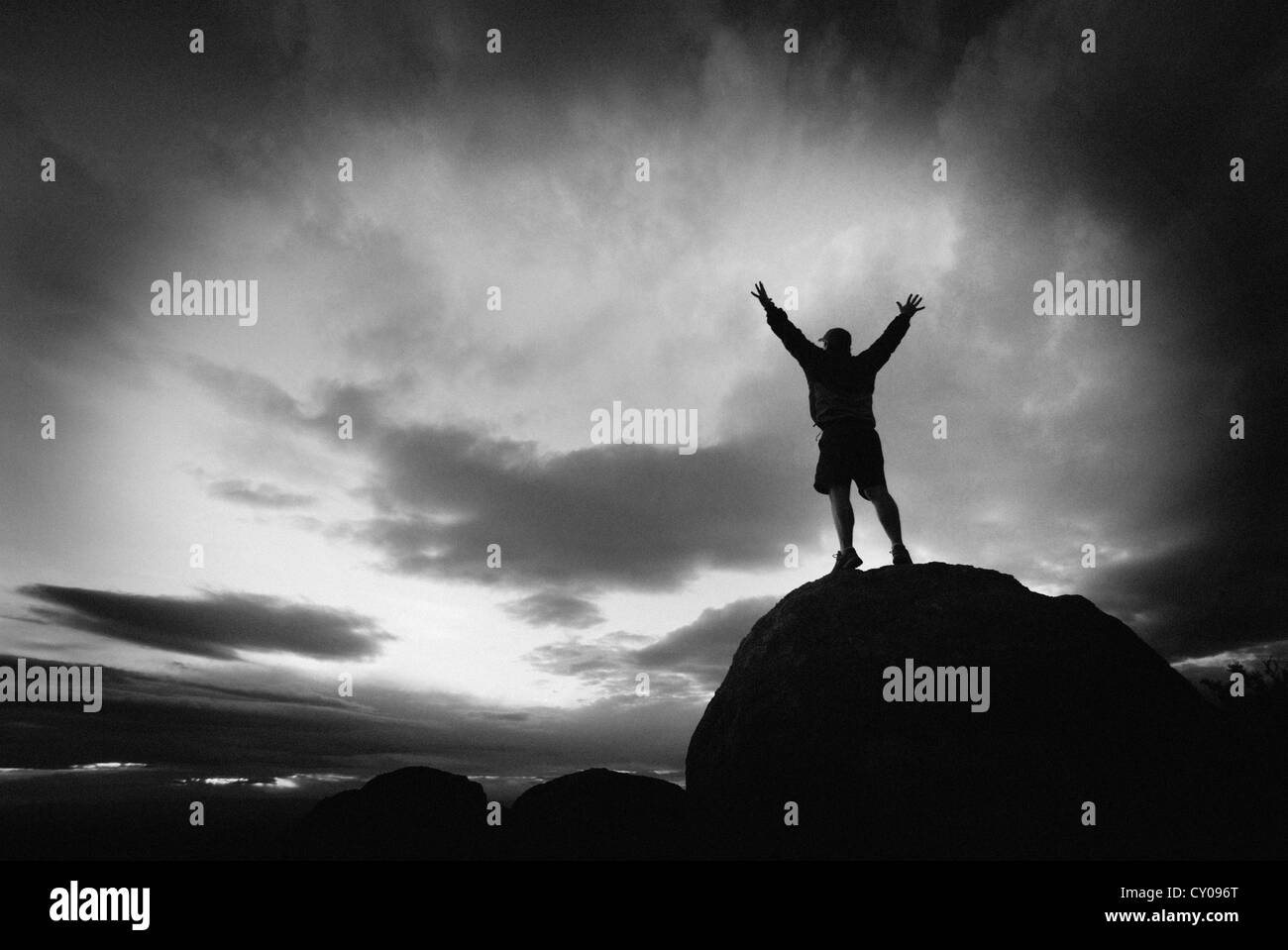 Male figure with raised arms hi-res stock photography and images - Alamy