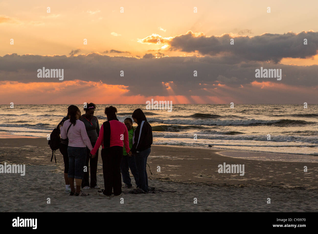 Island ocean sunrise beach prayer hi-res stock photography and images ...
