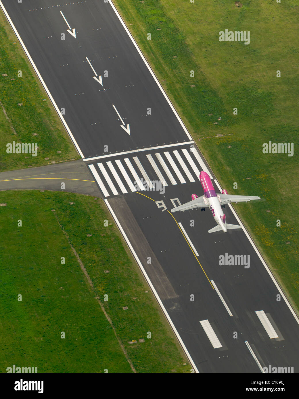 Aerial view, Dortmund Wickede Airport, runway, airplane taking off ...