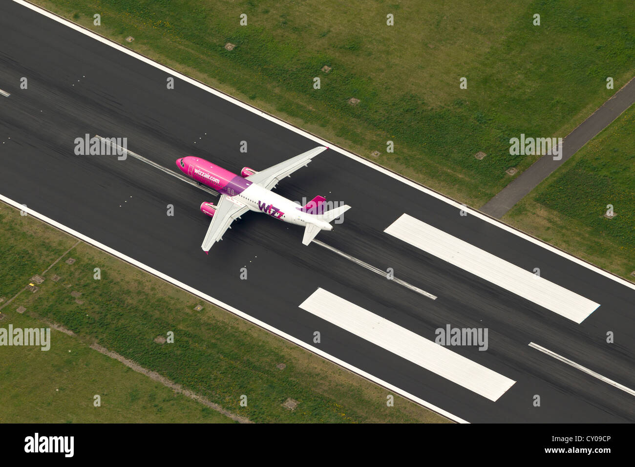 Aerial view, Dortmund Wickede Airport, runway, airplane taking off ...