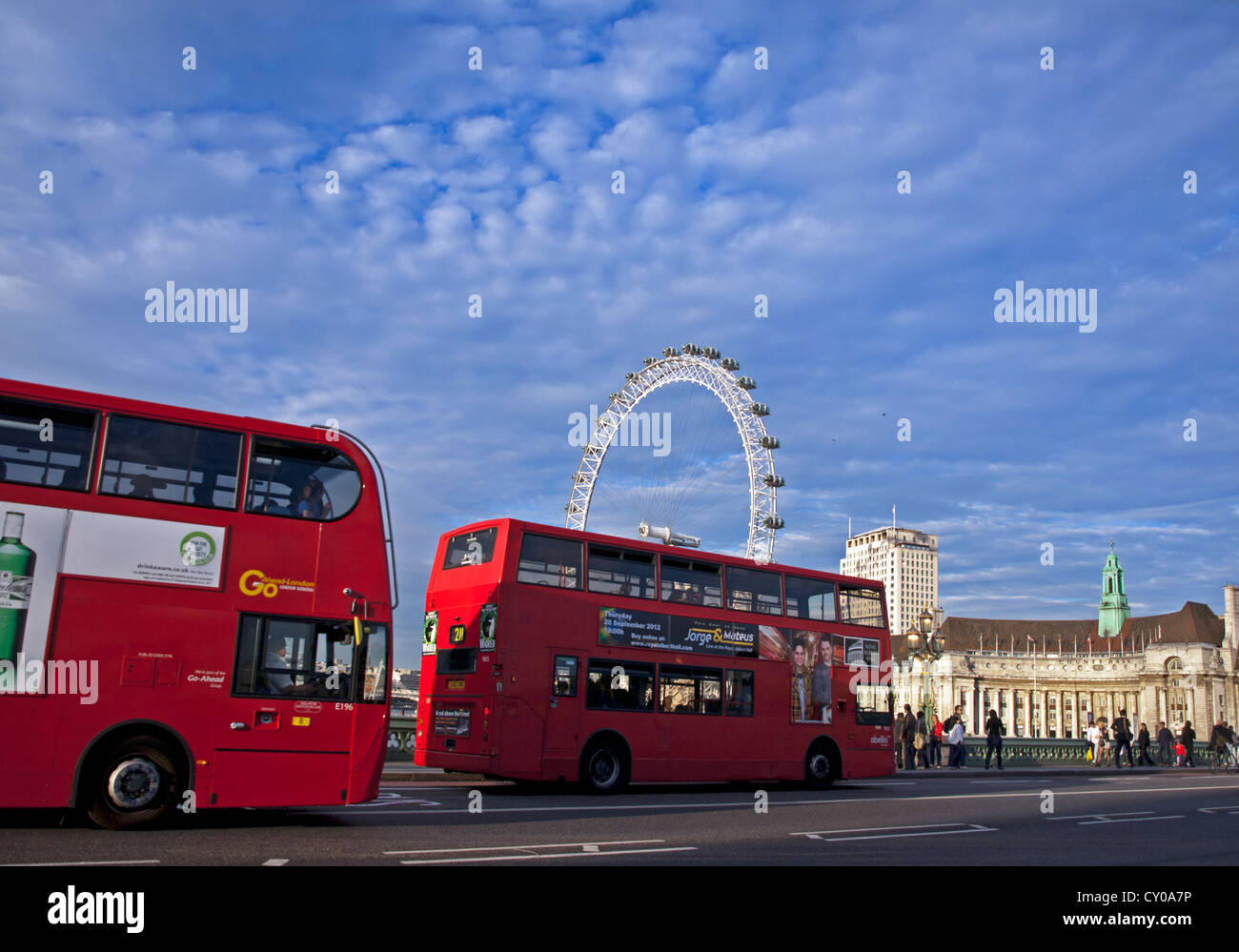 London buses on Westminster Bridge Road showing London Eye in ...