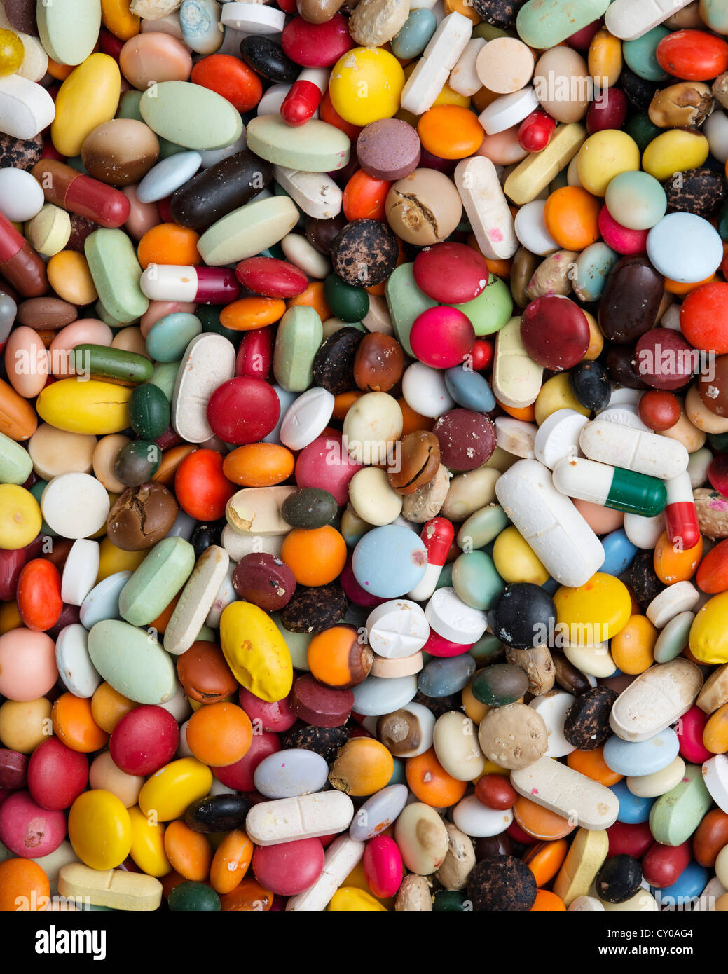 Medication past its use-by date, colourful mixture of pills, capsules ...