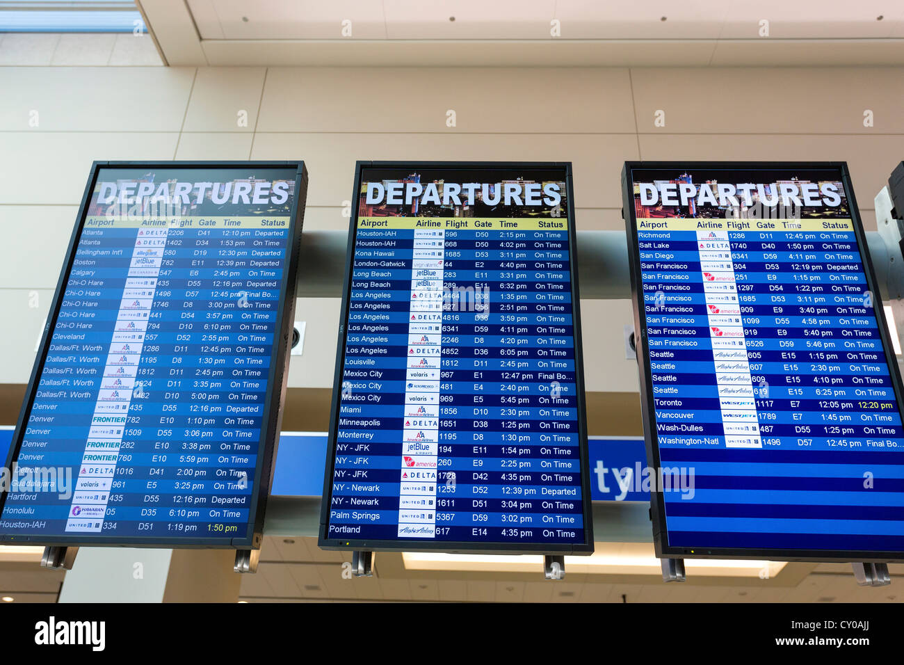 Modern departures displays at the airport Stock Photo - Alamy