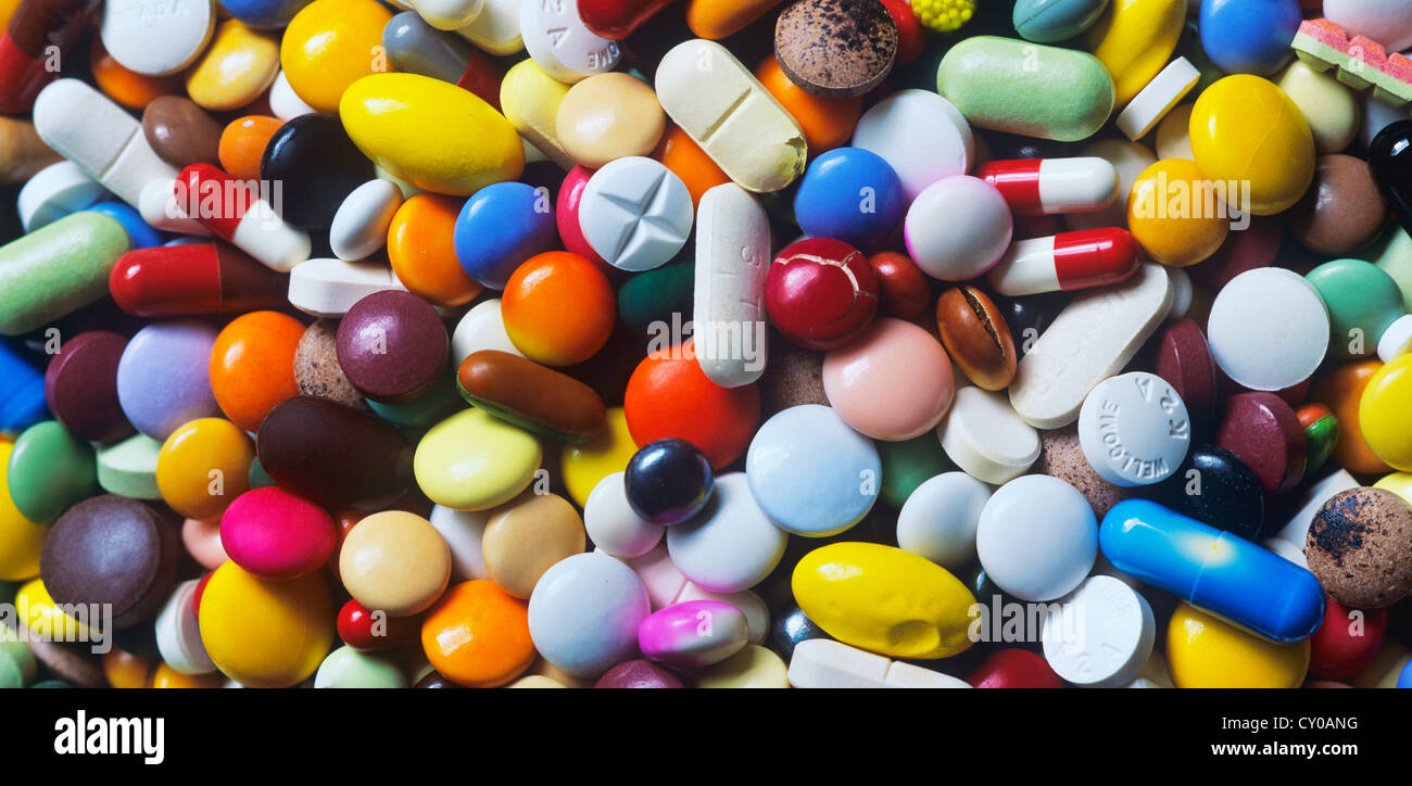 Expired medications, colourful mix of capsules, pills and tablets, full ...