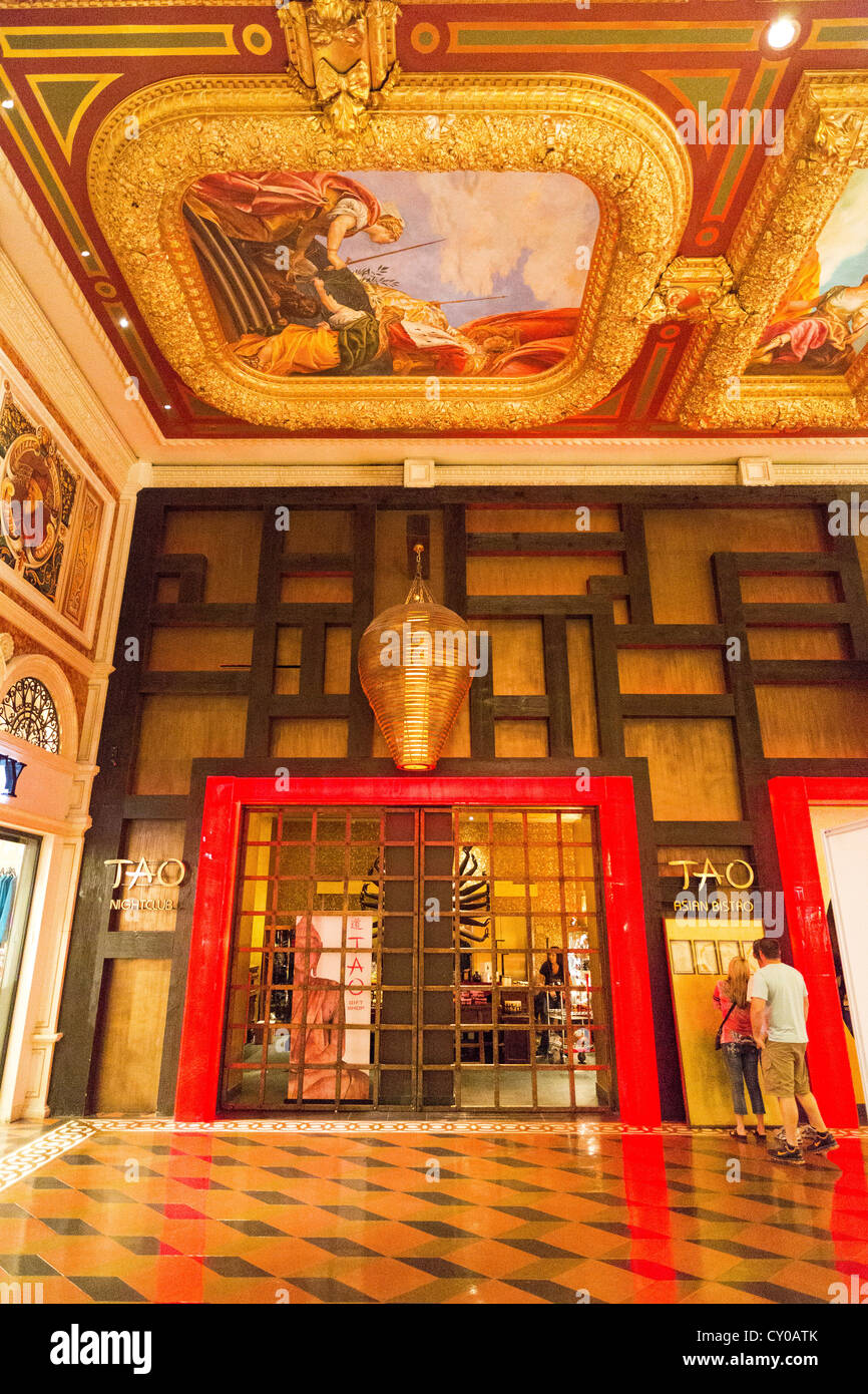 People reading a menu at the famous TAO restaurant located in Venetian ...