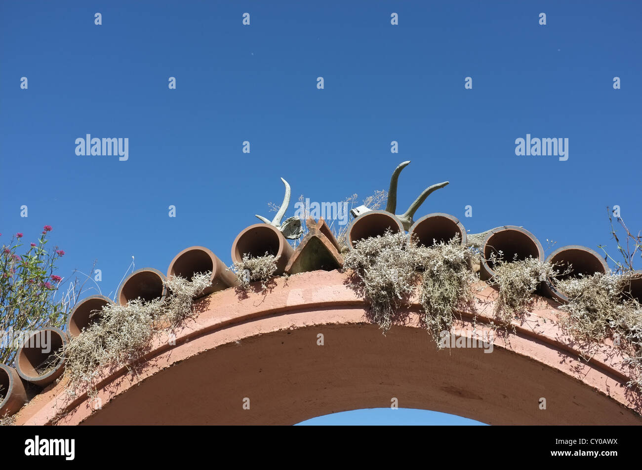 Terracotta arch with antlers at Butterfly World, St Albans ...