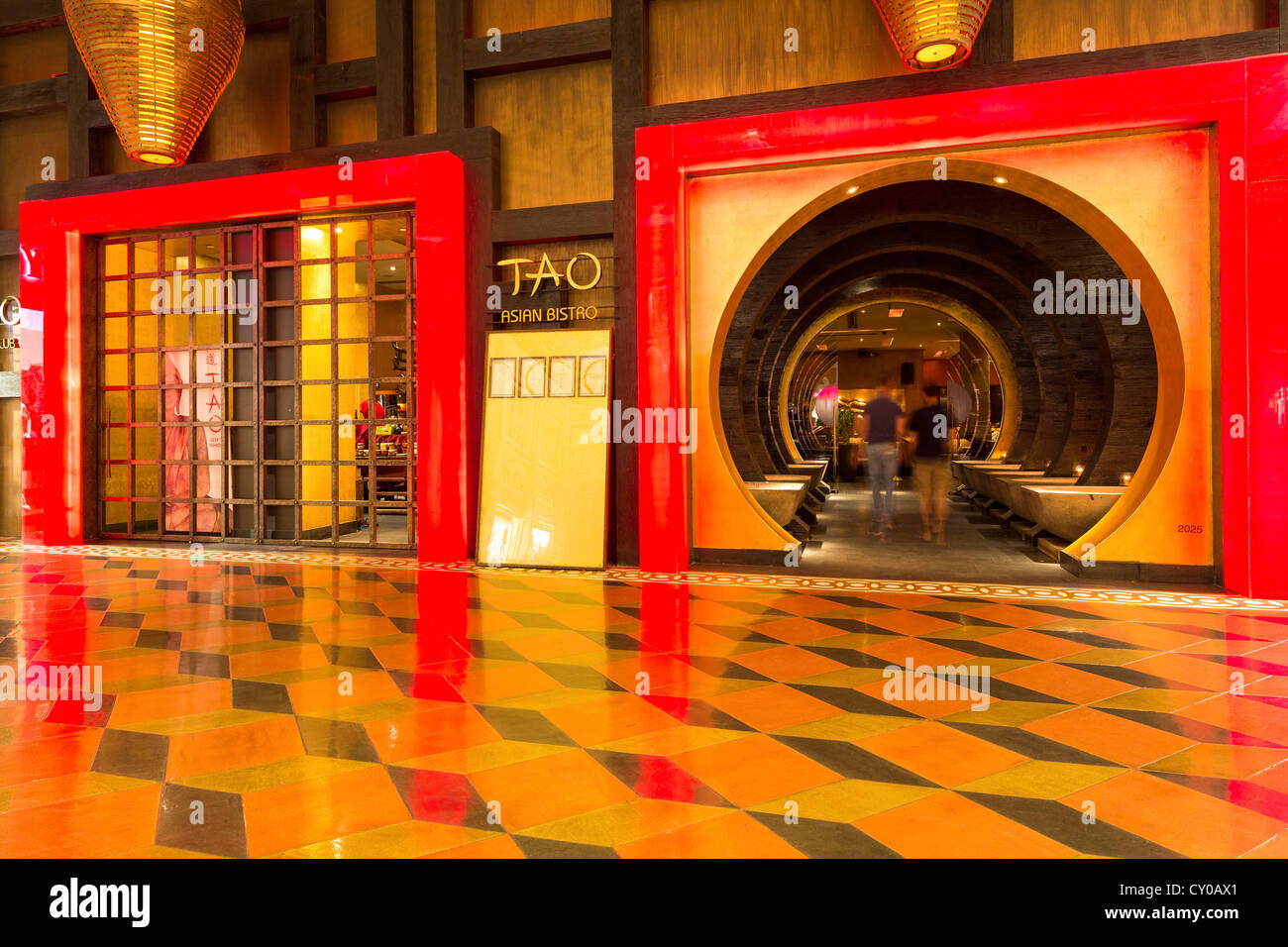 People reading a menu at the famous TAO restaurant located in Venetian ...