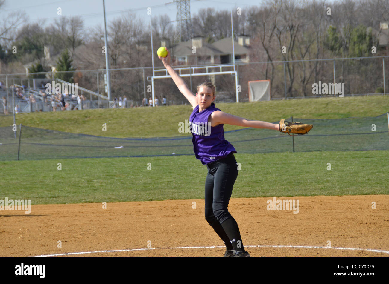 Pitcher in a high school softball game Stock Photo - Alamy