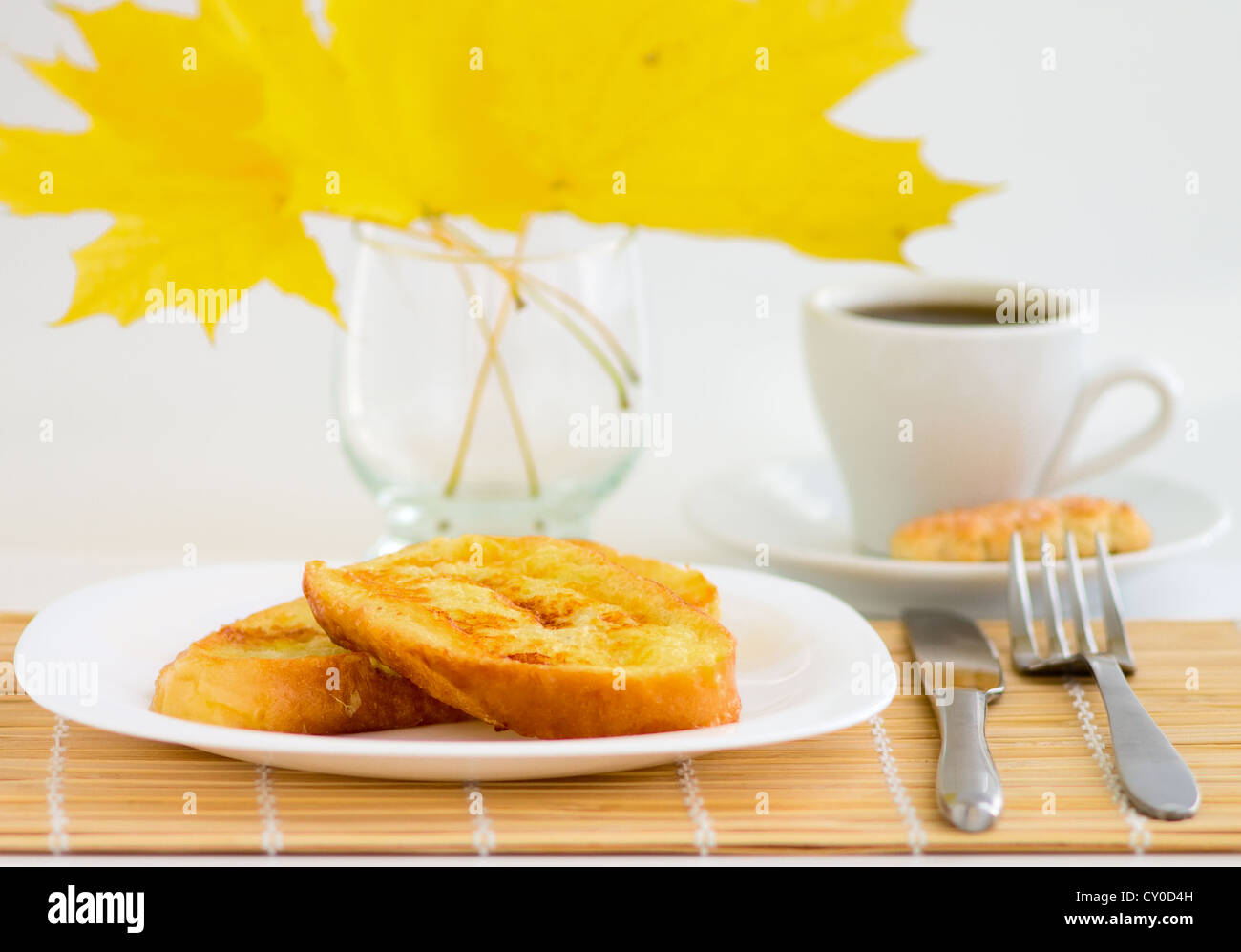 Coffee cup and sweet toast with autumn leaves on white background Stock ...