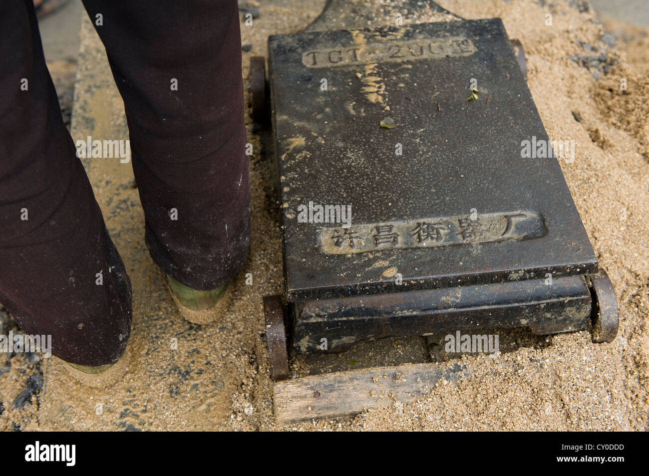 A basic counterweight balancing scale at a construction site at the San ...