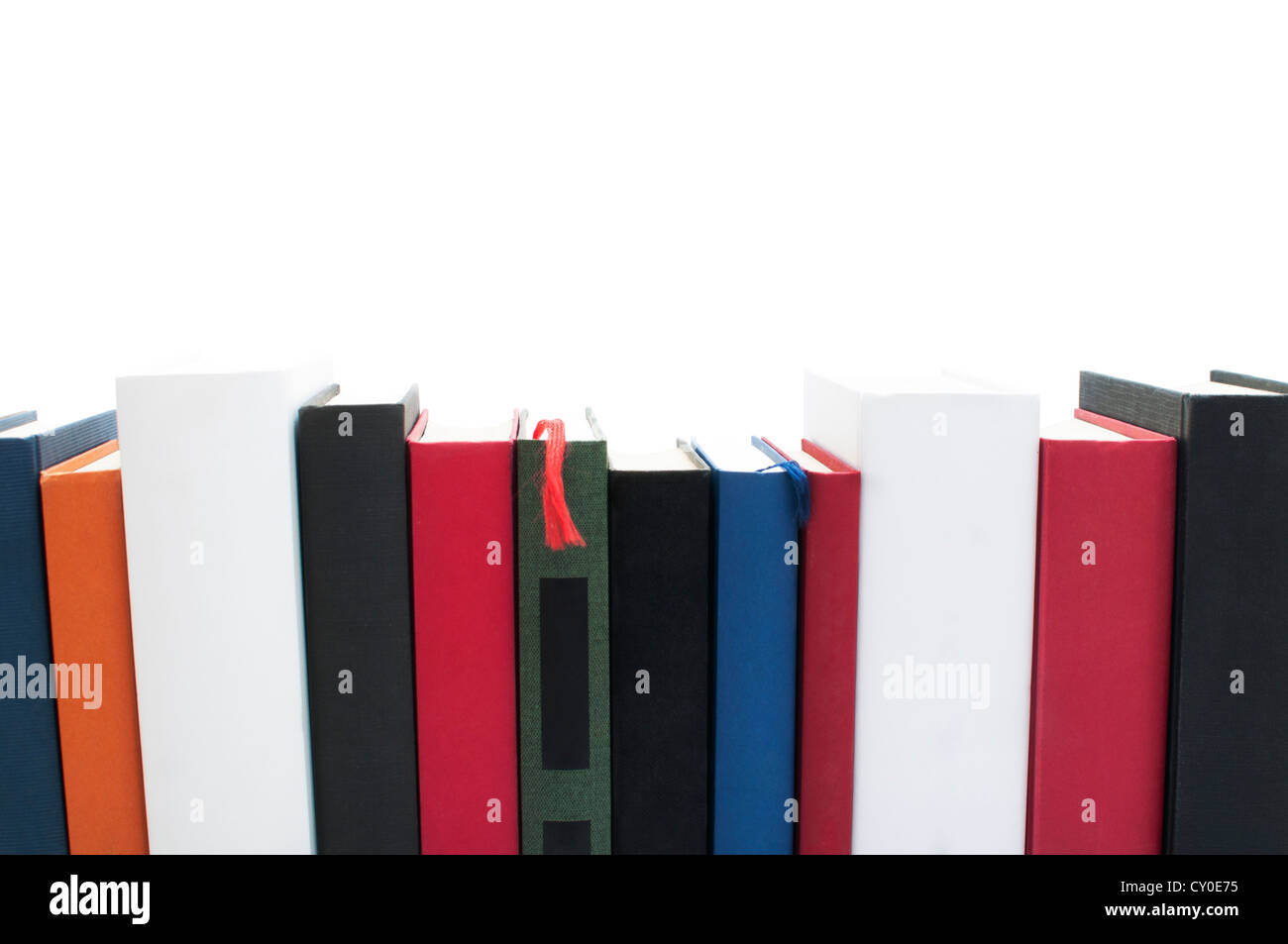 Books of different sizes and colors isolated on white background Stock ...