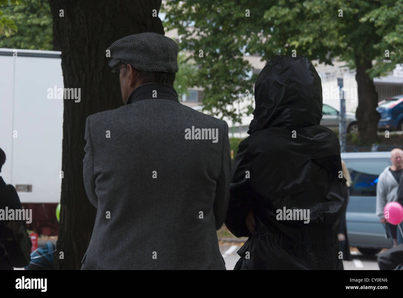 Two people under a tree in Lahti Finland Stock Photo - Alamy