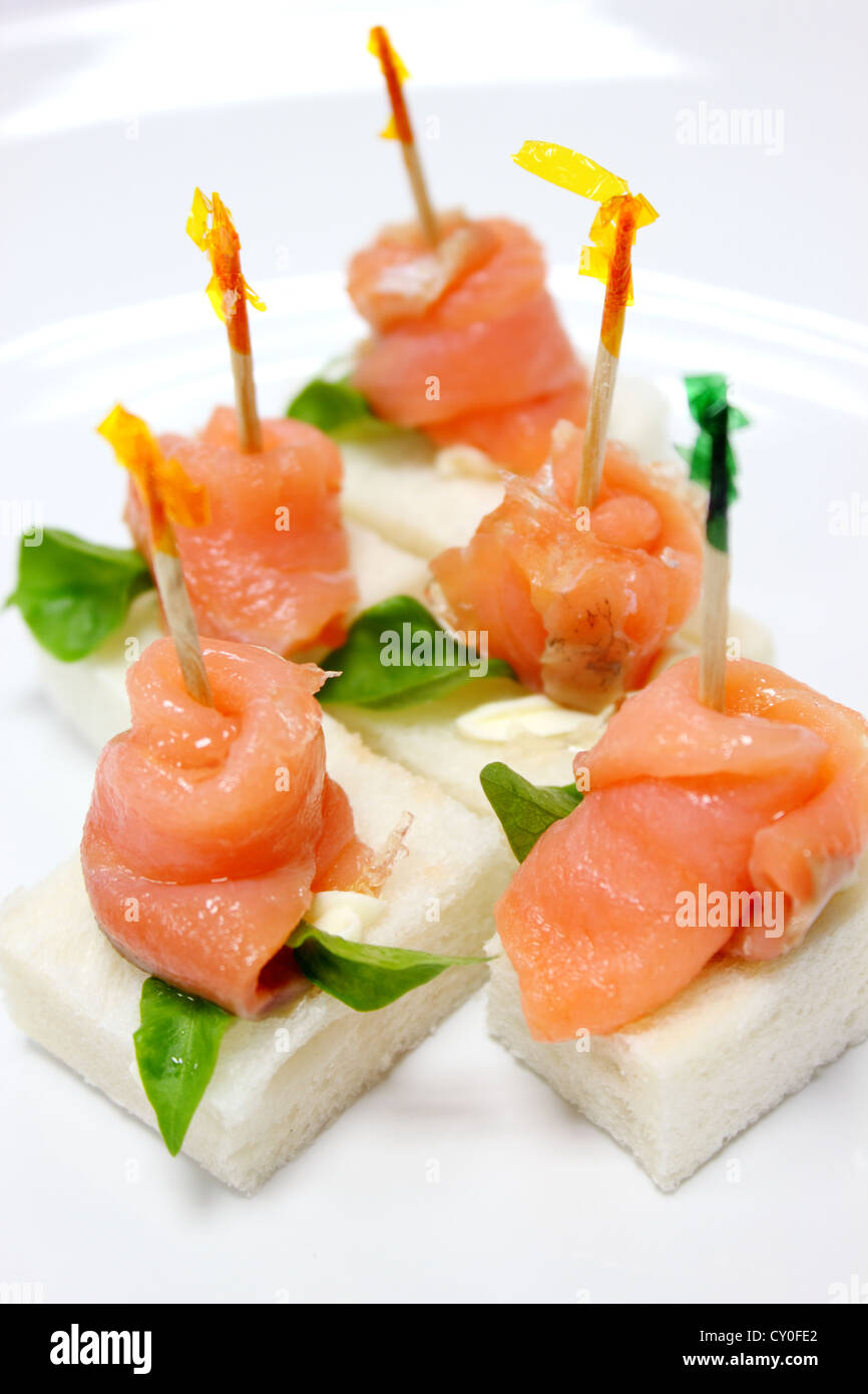 A canape smoked salmon on white bread Stock Photo - Alamy
