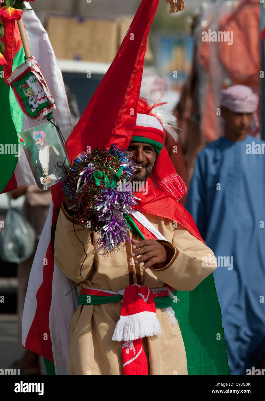 Omani Football Fan Walking In The Street, Sinaw, Oman Stock Photo - Alamy