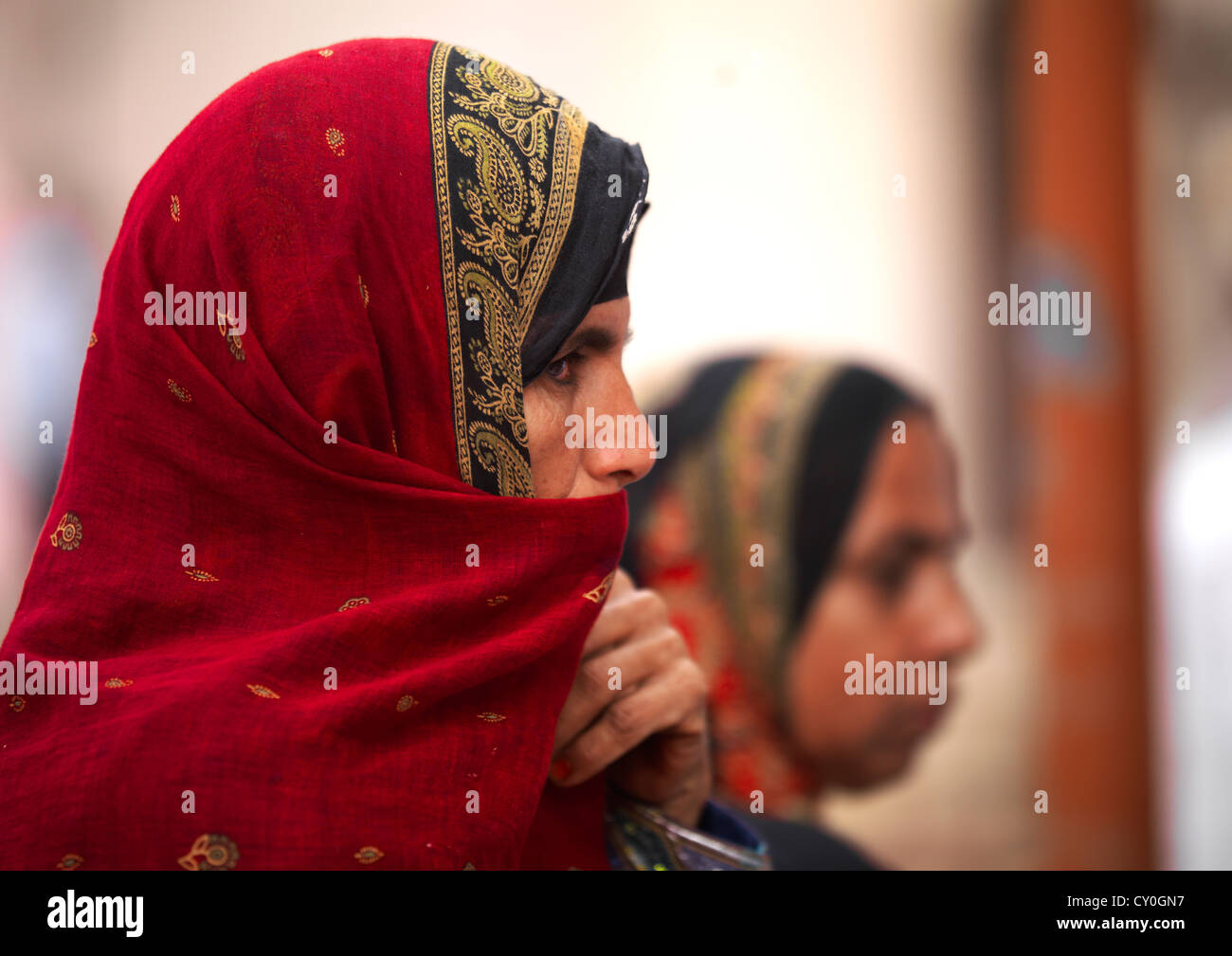 Portrait Of Women In Red Scarf, Nizwa, Oman Stock Photo - Alamy