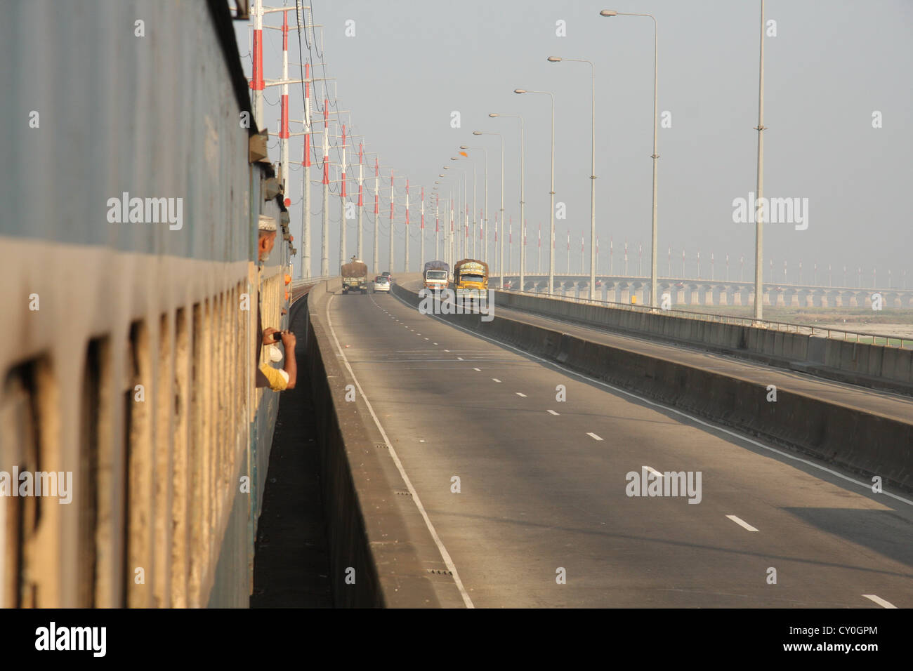 A train runs through the Bangabandhu Multipurpose Jamuna Bridge ...