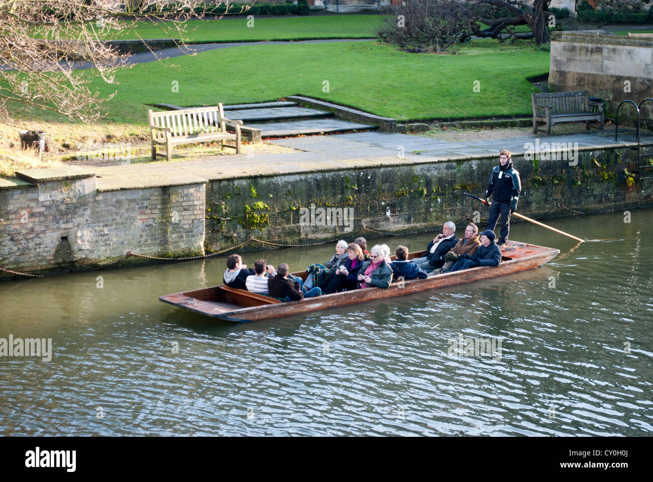 Large punt filled with people on the Cam near King's College Cambridge ...