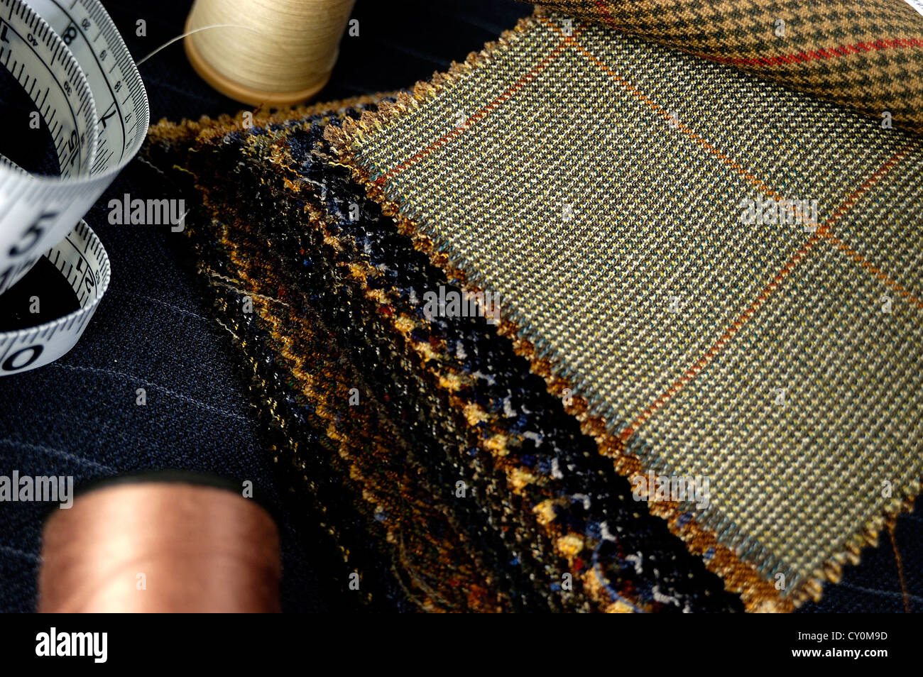 Selection of Different Materials with Tape Measure and Cotton Thread ...