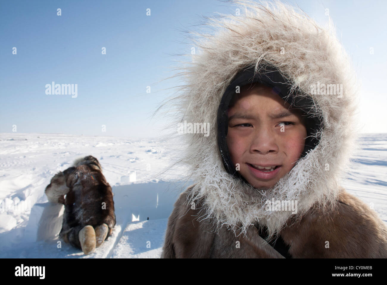 Inuit boy on the North Pole Stock Photo - Alamy