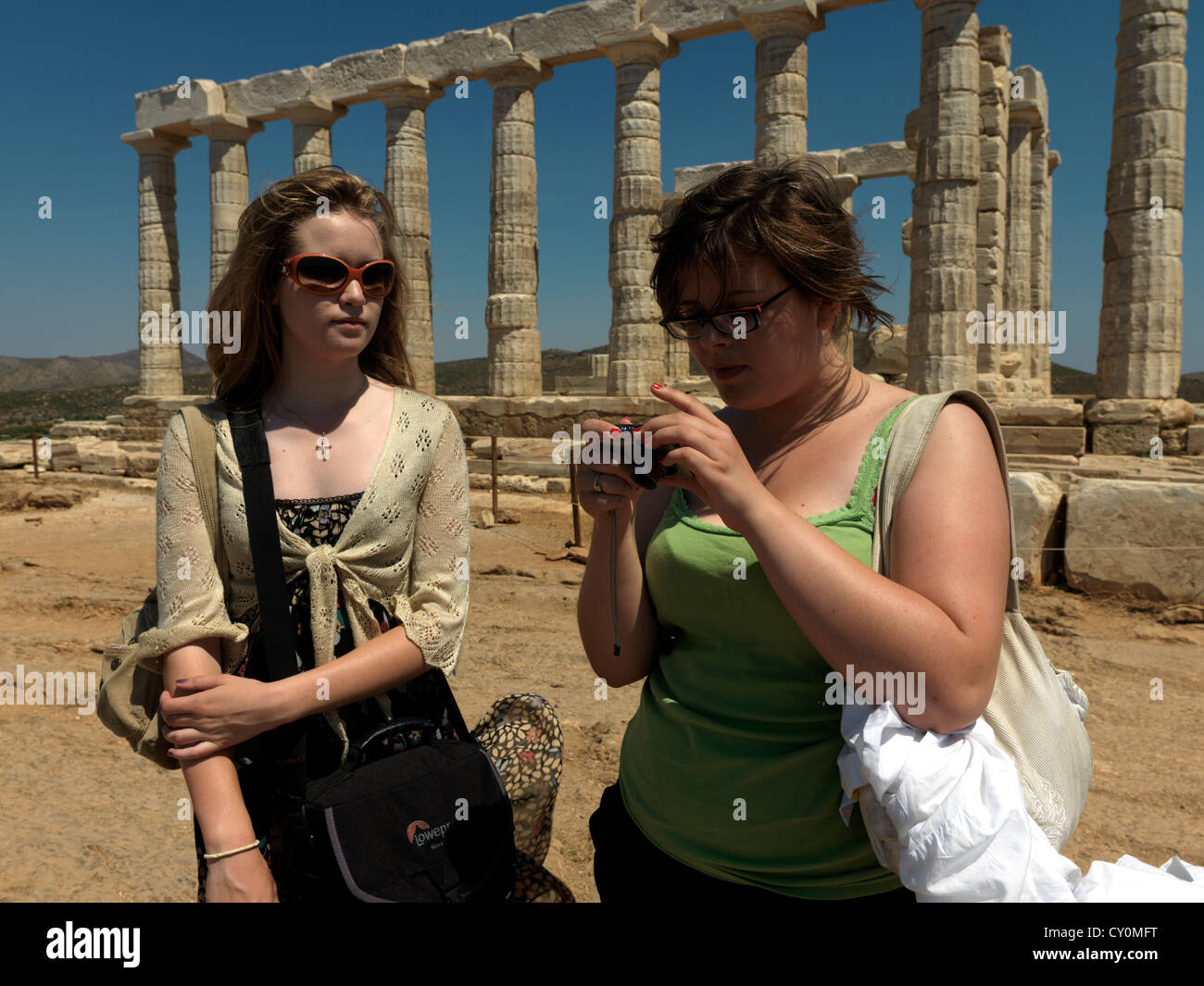Attica Greece Sounion Teenage Girls Looking At Picture On Digital ...