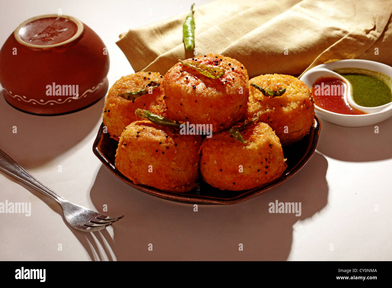 Dhokla is a vegetarian food item that originates from Gujarat in India ...