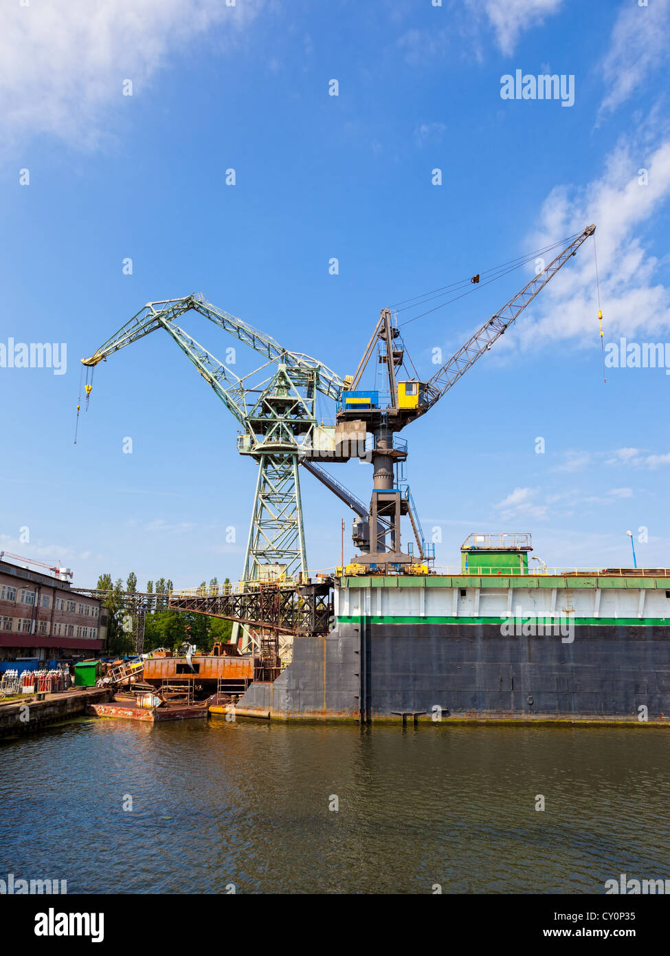 Big cranes and dock at the shipyard in Gdansk, Poland Stock Photo - Alamy