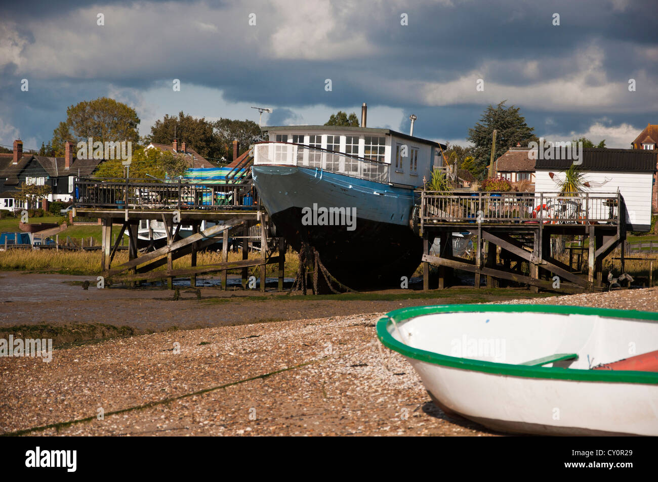 Old sailing ship converted to houseboat Stock Photo - Alamy