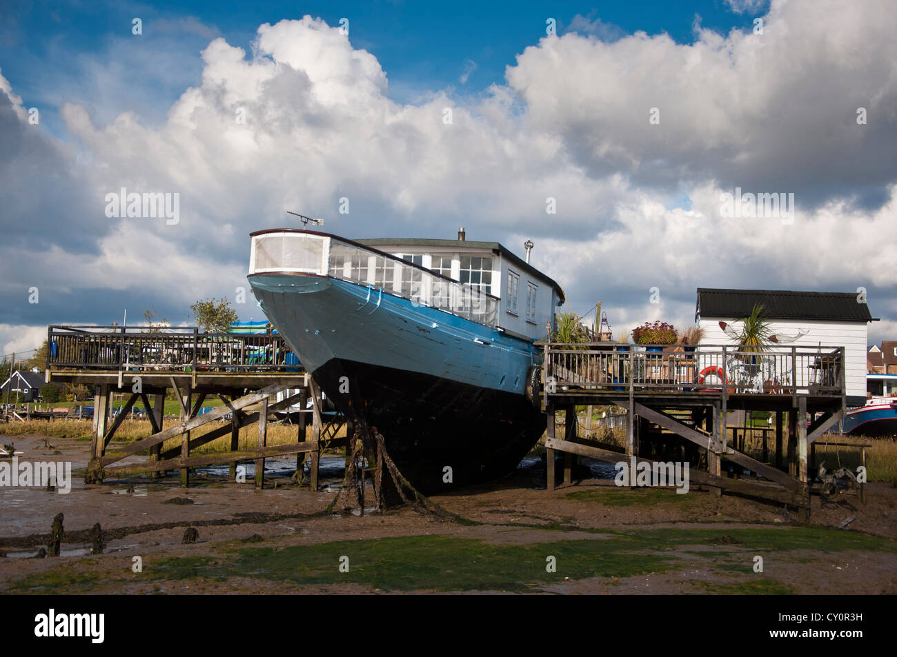Old sailing ship converted to houseboat Stock Photo - Alamy