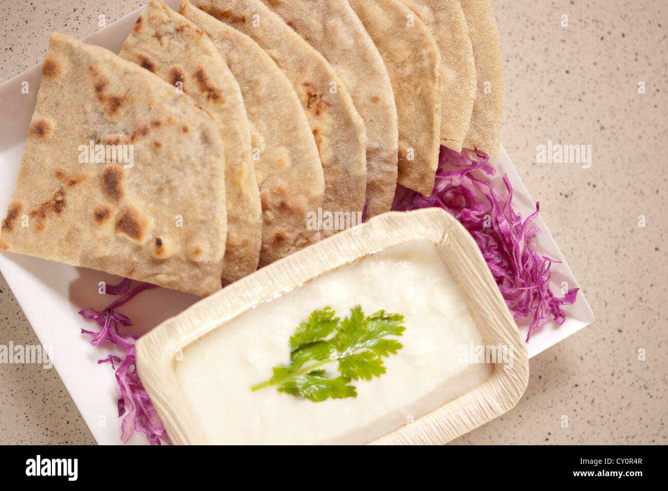 Aloo Paratha is a stuffed spicy boiled potato and onions mix Indian ...