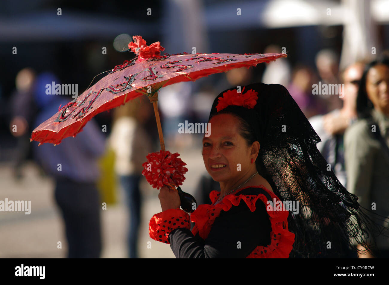 Woman in traditional Spanish clothing, Plaza Mayor, Madrid Stock Photo ...