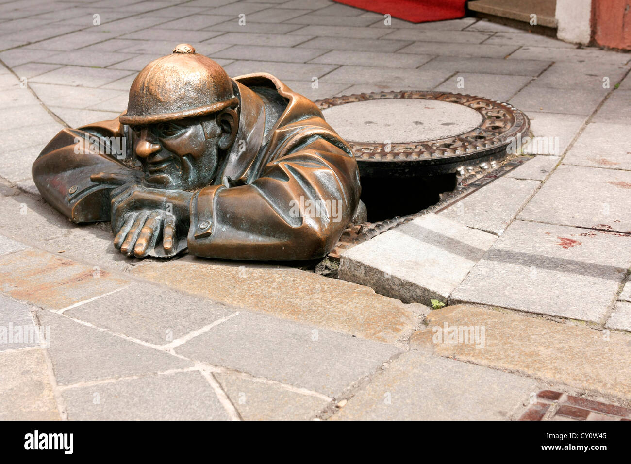 Cumil - Rubberneck statue man at work in Bratislava old town Stock ...