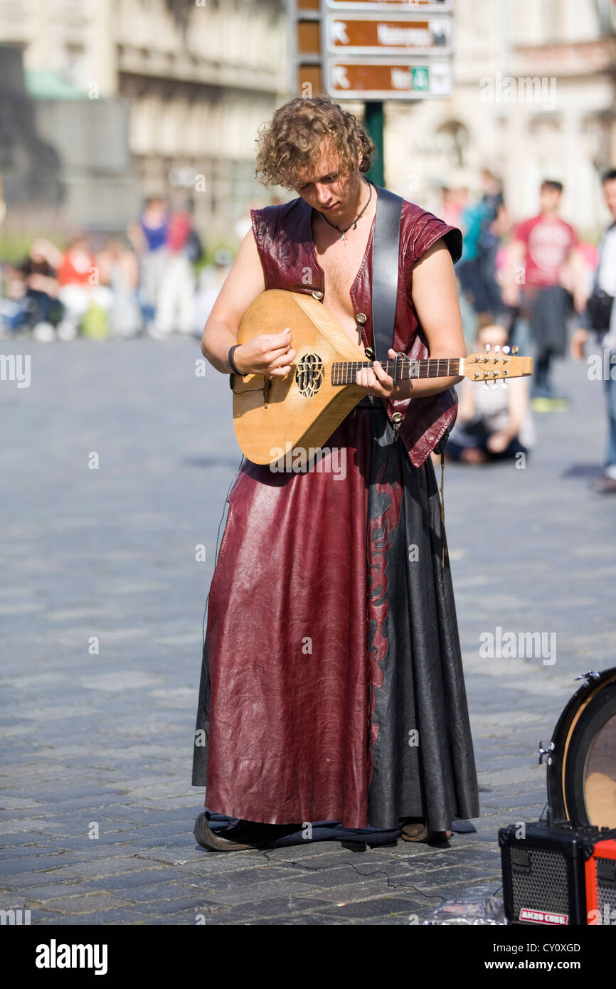 Musicians in traditional dress playing hi-res stock photography and ...