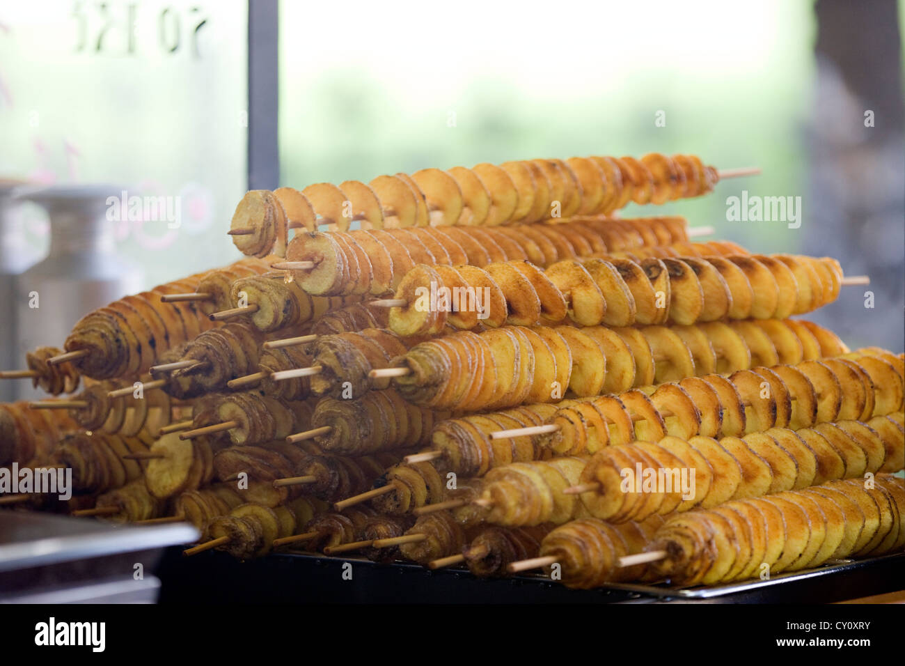 Potato chips on Skewers on a market stall in Prague Stock Photo - Alamy