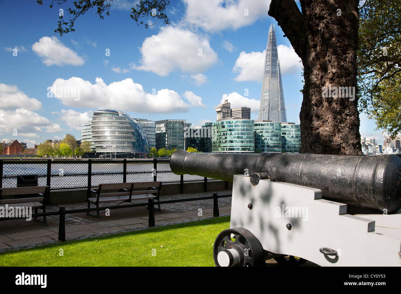 England. London. Cannon by the River Thames. City Hall and the Shard ...