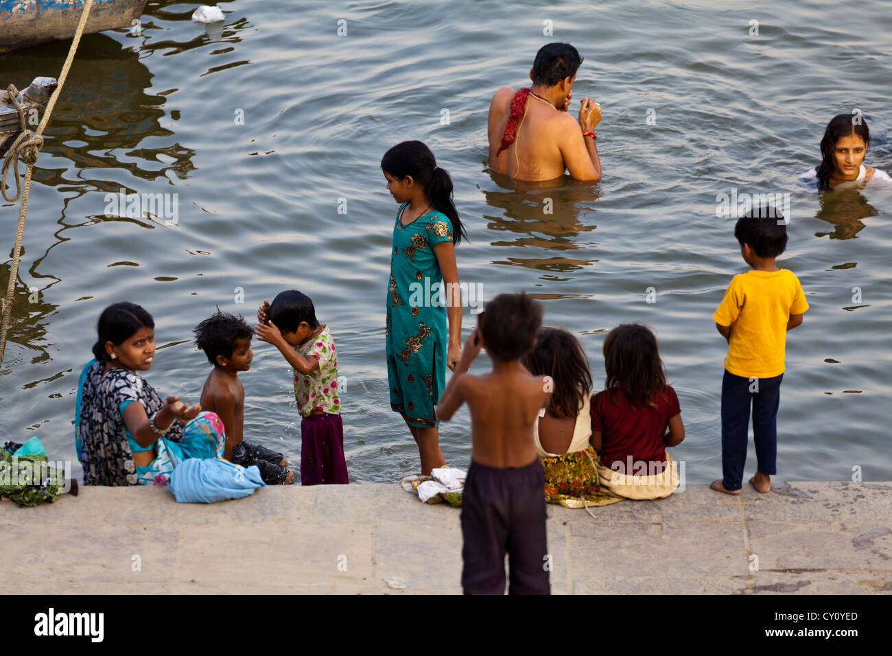 Taking a Bath in the holy River Ganges in Varanasi, India Stock Photo ...