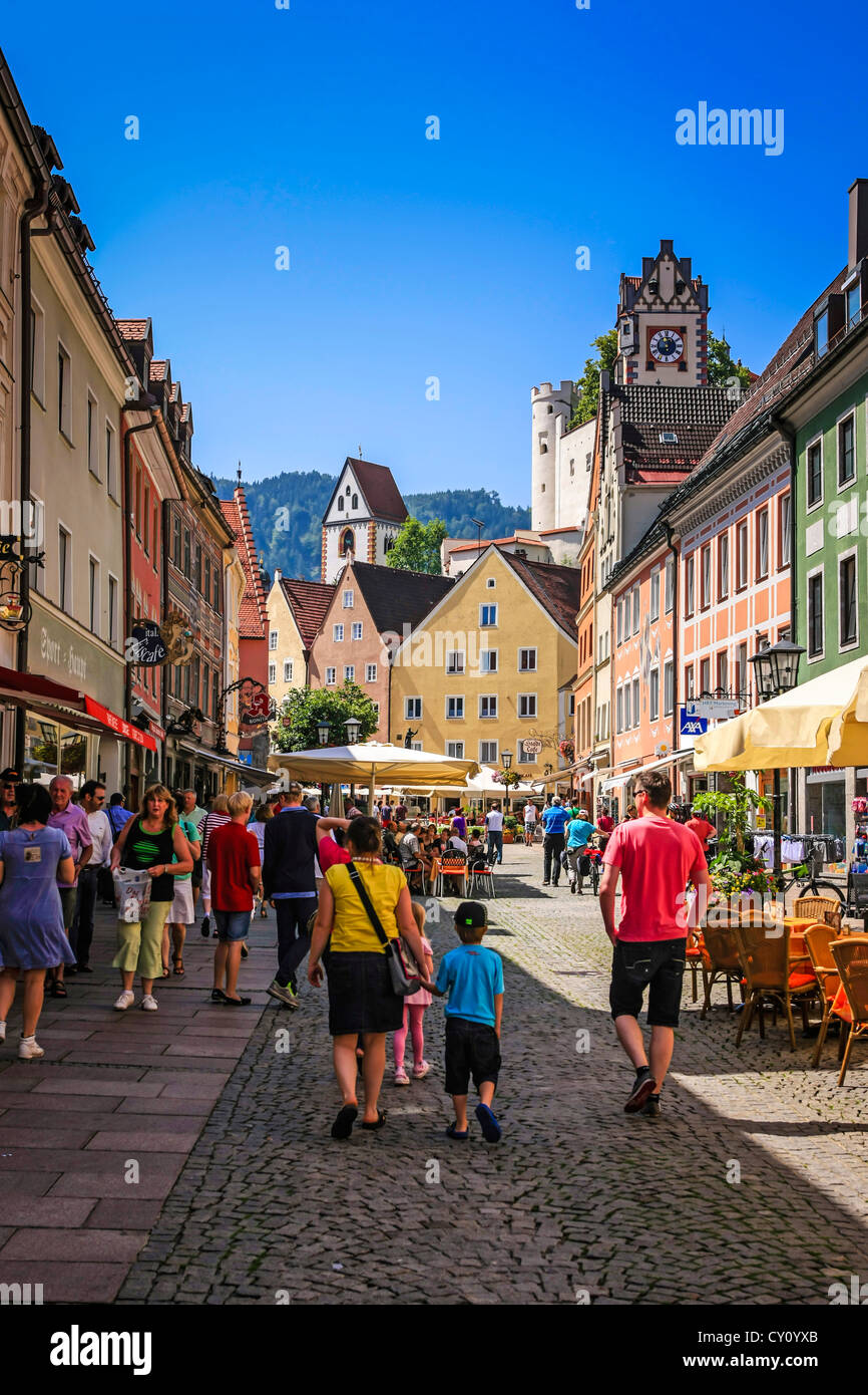 People wandering around the main shopping street in Fussen germany ...