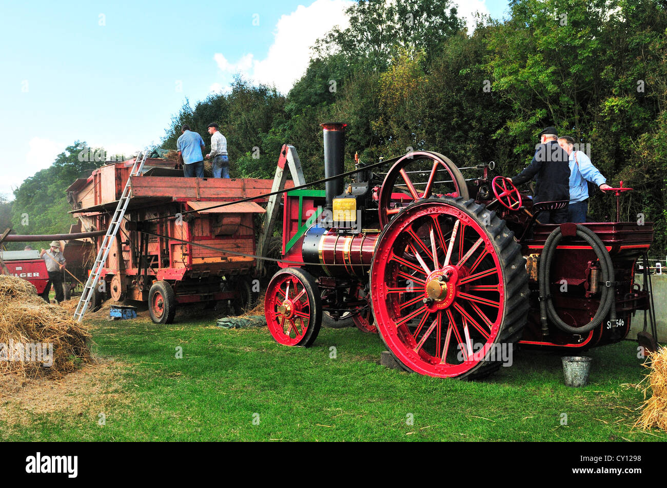 Foden Steam engine and Marshall Sons & Co. Ltd. Threshing drum process ...