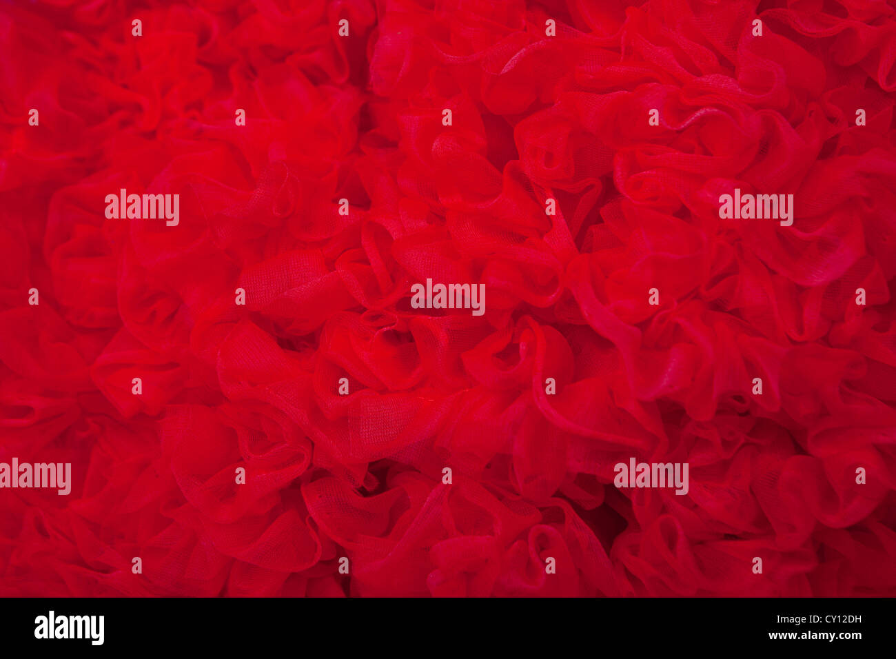 red textured net fabric background Stock Photo - Alamy