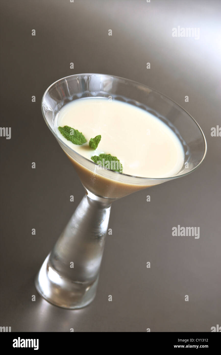 Cocktail with mint leaves and cream Stock Photo - Alamy