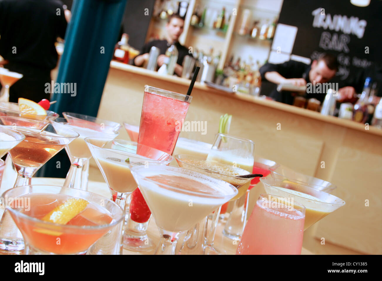Group of cocktails displayed on a table in a bar Stock Photo - Alamy