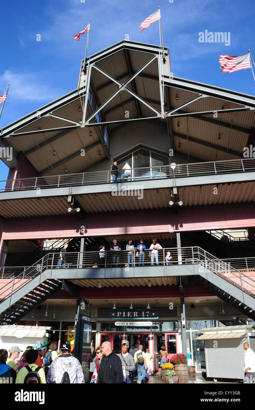 Blue sky portrait people standing wharf, leaning balconies, flower ...