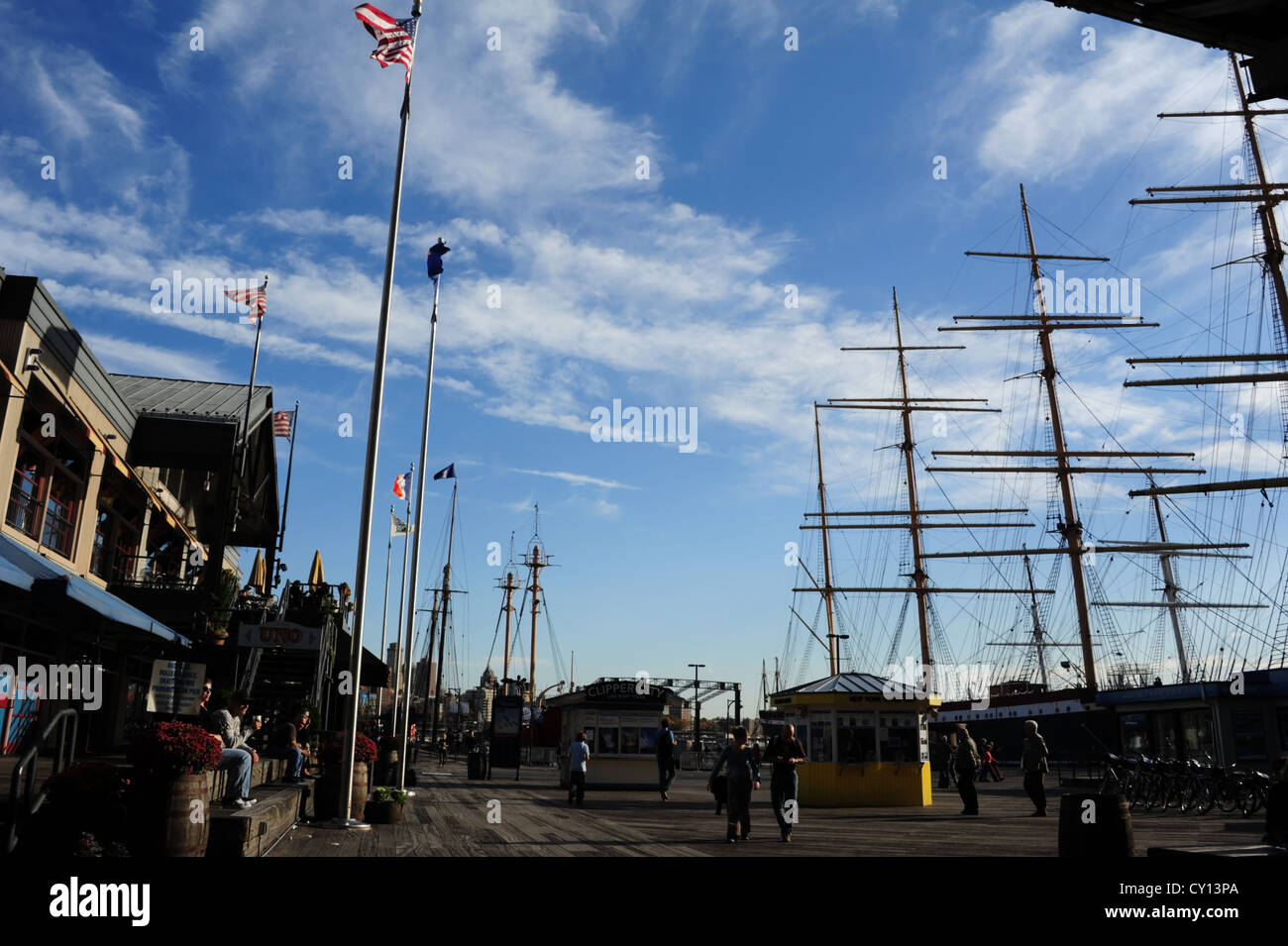 Blue sky view, from FDR Highway, ticket booths, sailing ships, flags ...