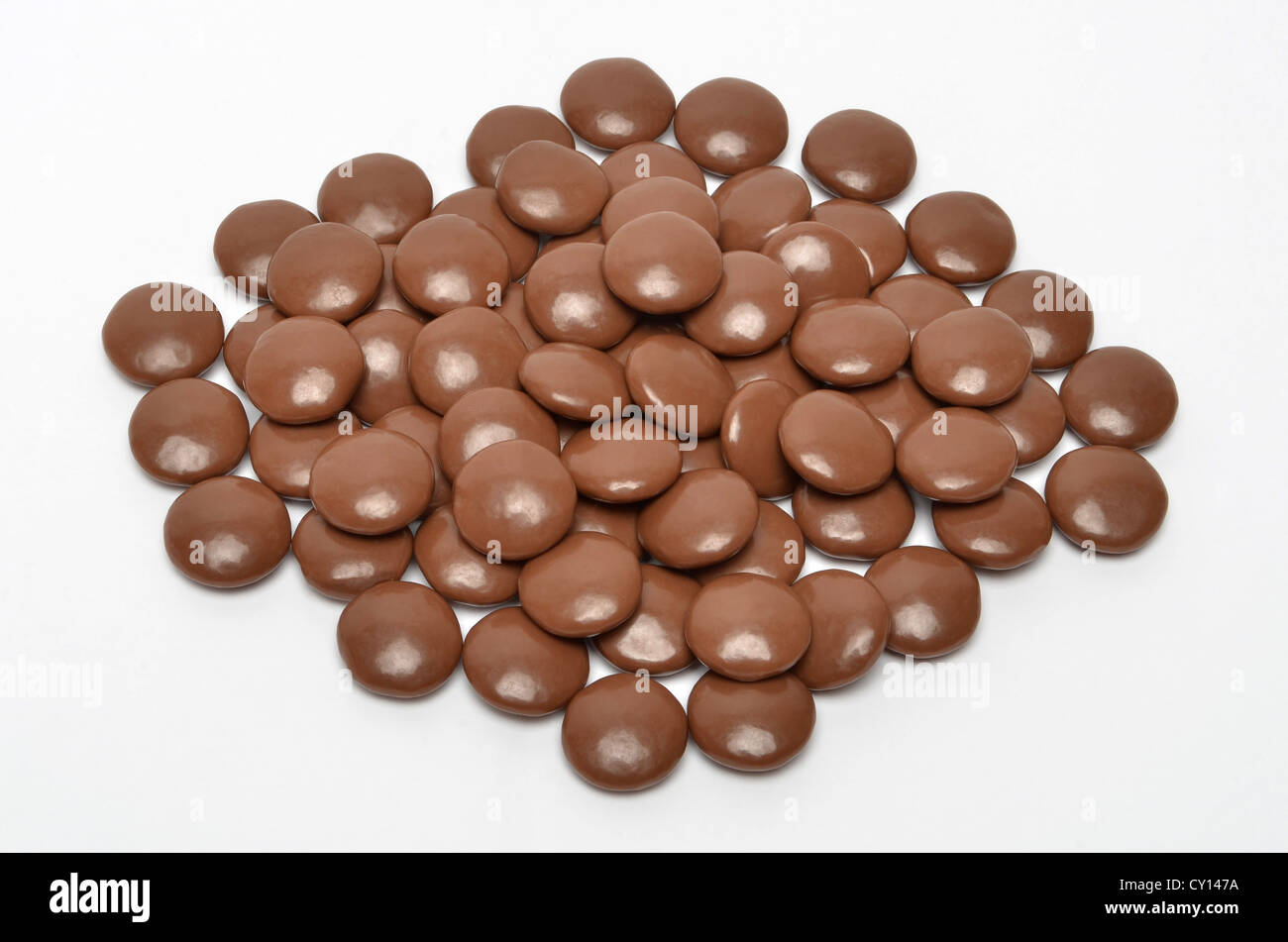 Chocolate drops isolated on white background Stock Photo - Alamy