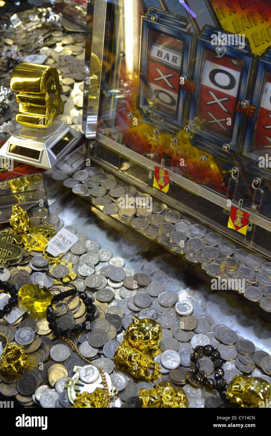 Amusement arcade game money hi-res stock photography and images - Alamy