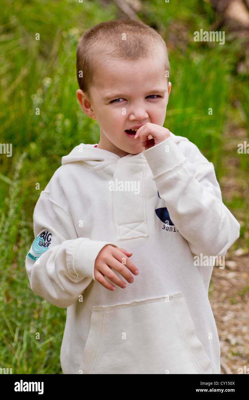 Autistic boy is nervous while hiking at a new park Stock Photo - Alamy