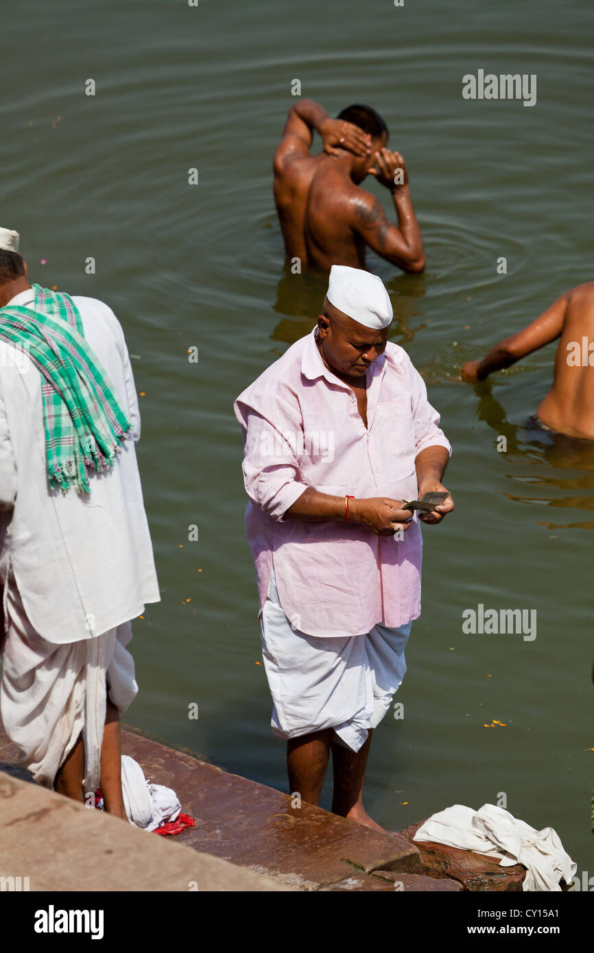 Men bathing in the River Ganges in Varanasi, India Stock Photo - Alamy