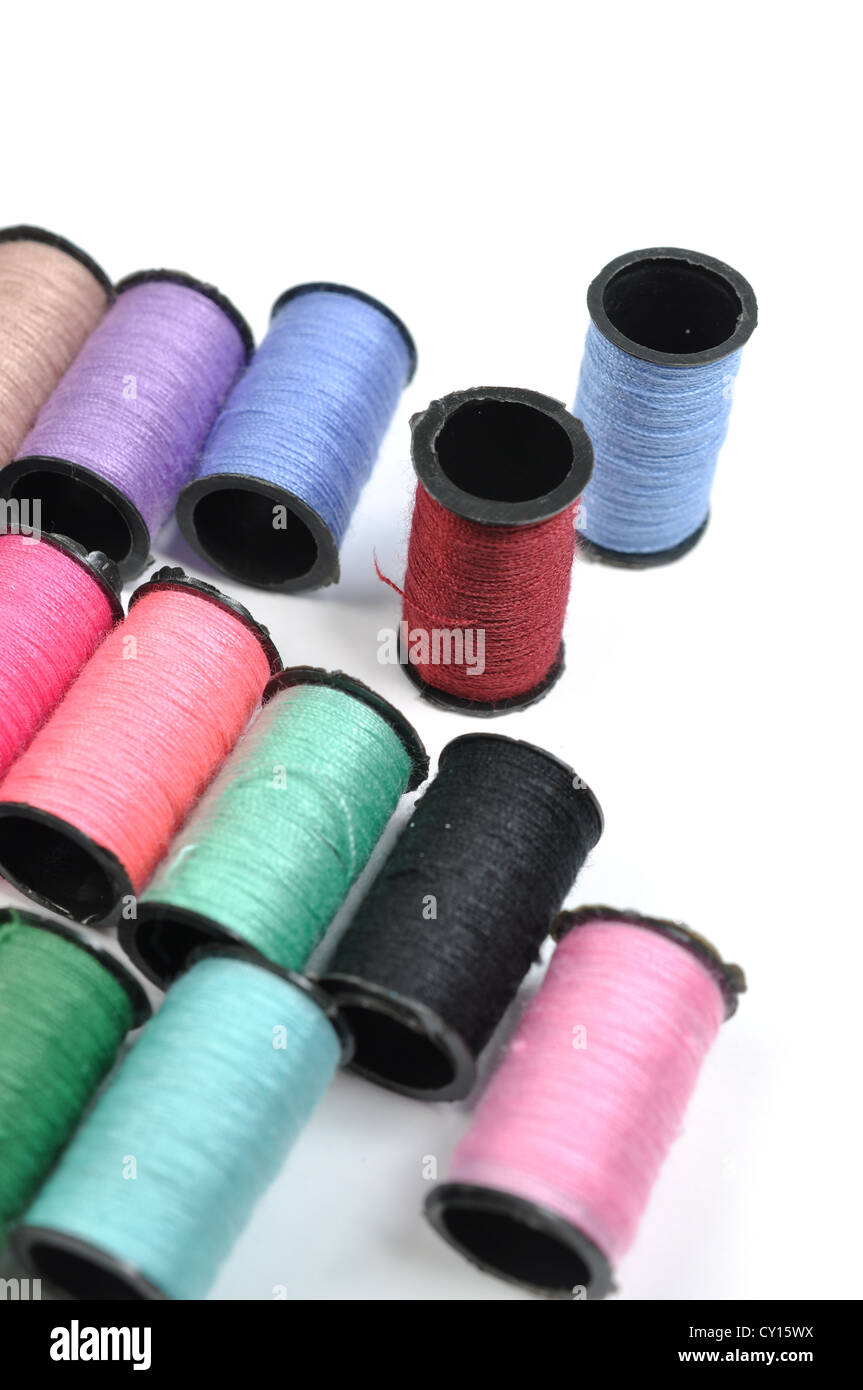 Color threads on white background Stock Photo - Alamy